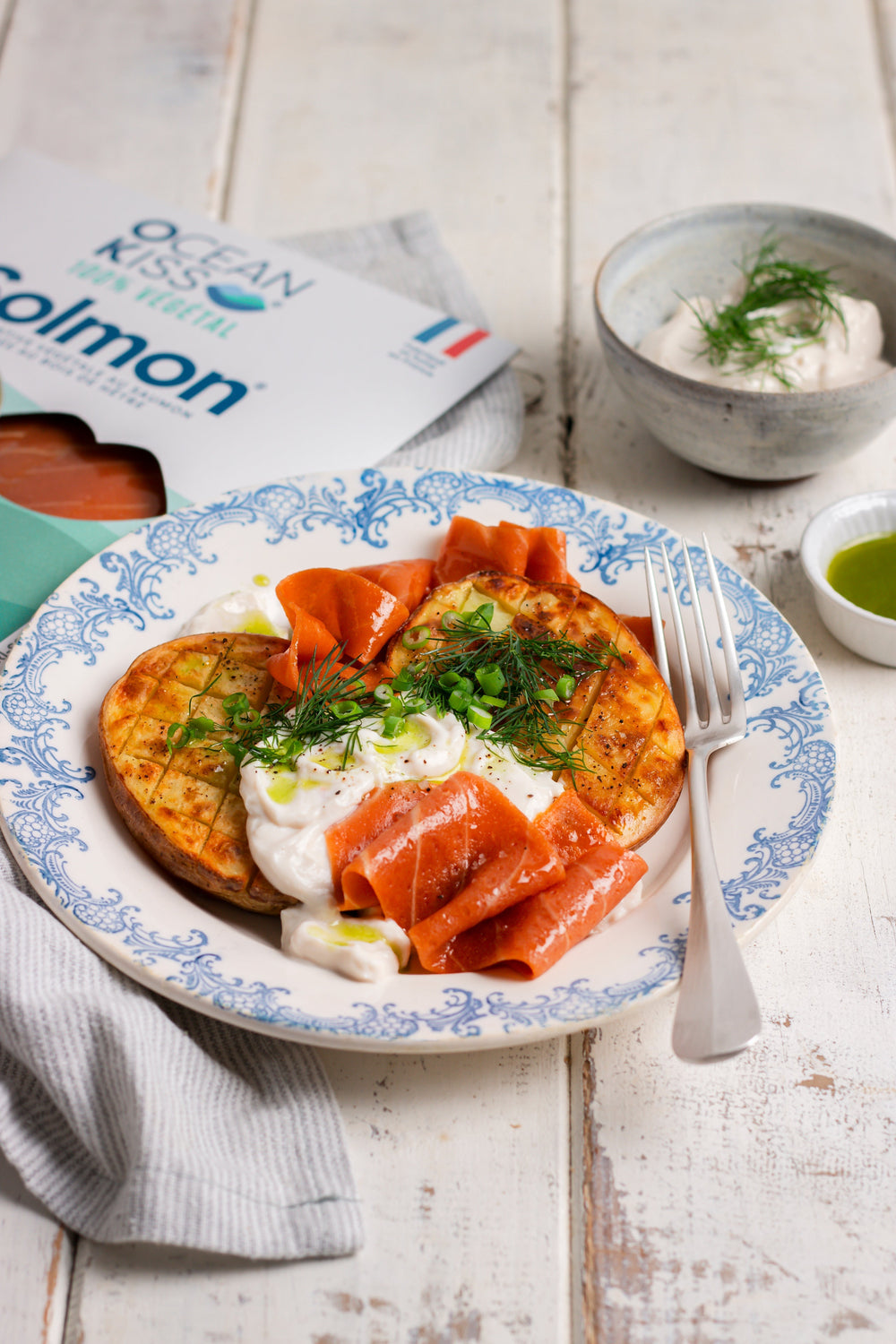 Roasted potatoes topped with SOLMON® - Yogurt sauce and dill oil ...